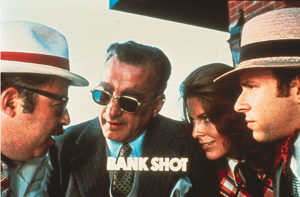 Production stills from the classic film "Bank Shot" with music by John ...